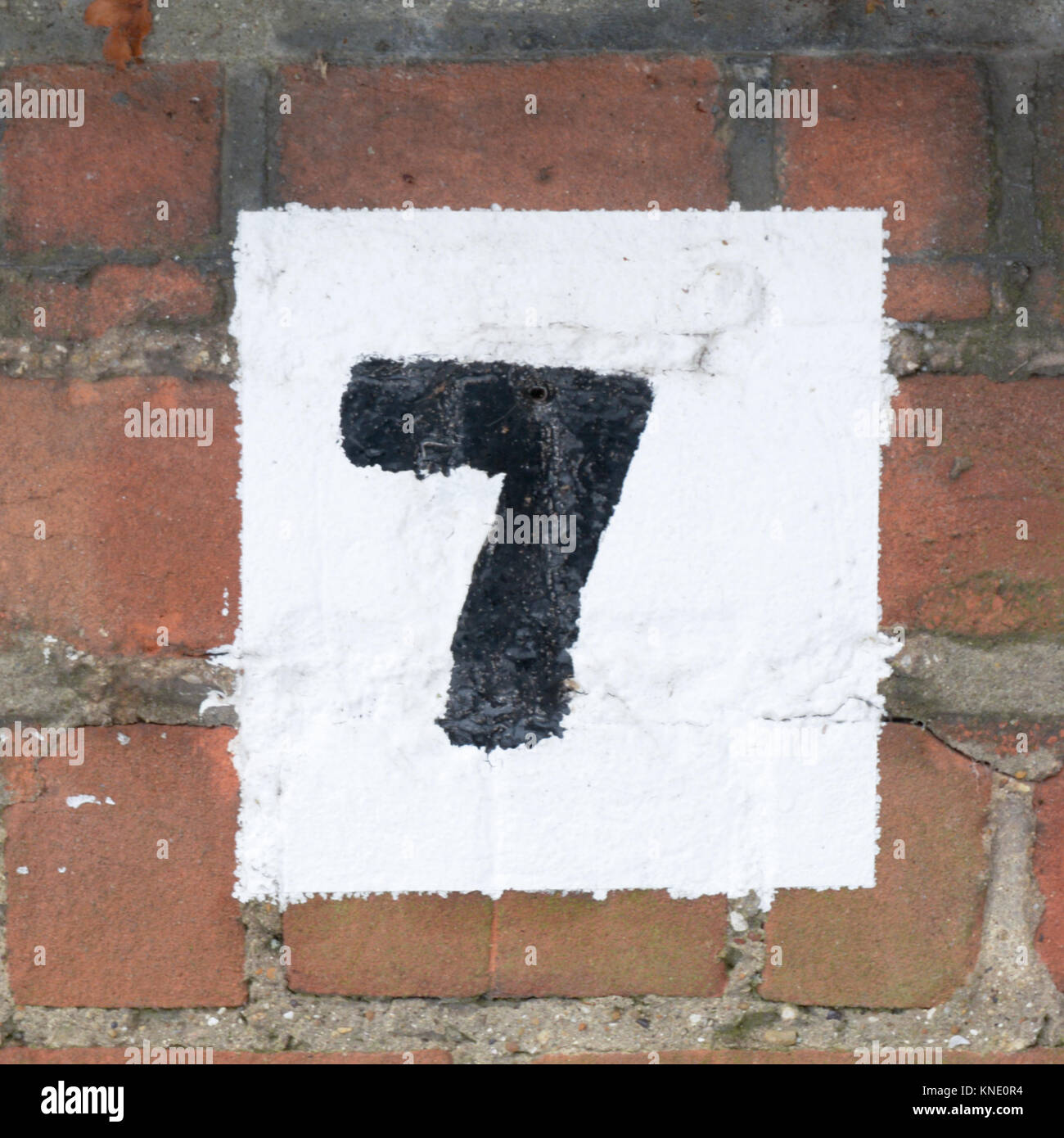 Painted house number seven sign on wall Stock Photo - Alamy