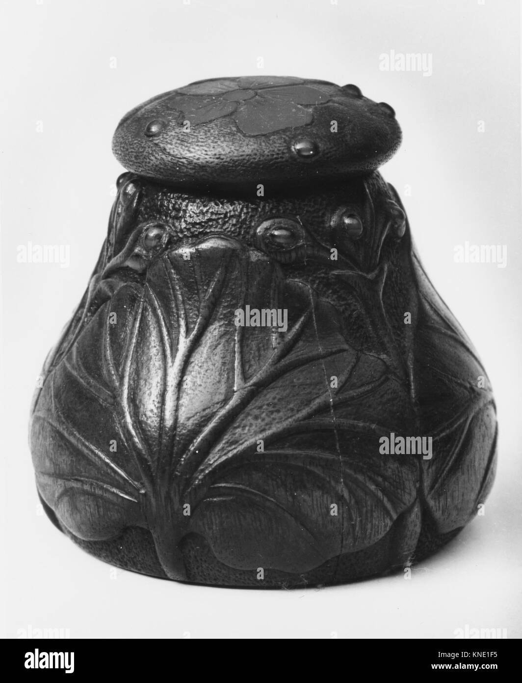 This covered box by Louis Comfort Tiffany, made of wood and glass by ...