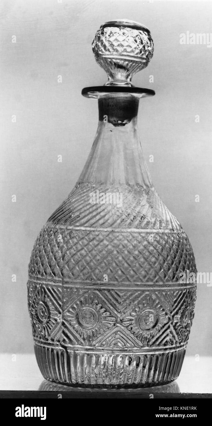An American decanter, 1820–1840, made of blown molded lead glass ...