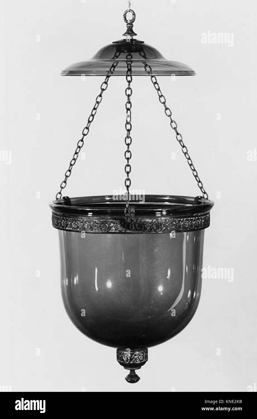 This hanging lantern, an exquisite example of metalwork, showcases ...