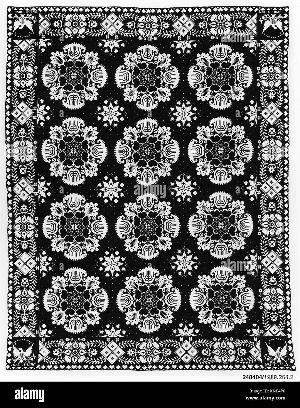 This coverlet is a textile artwork featuring intricate weaving ...
