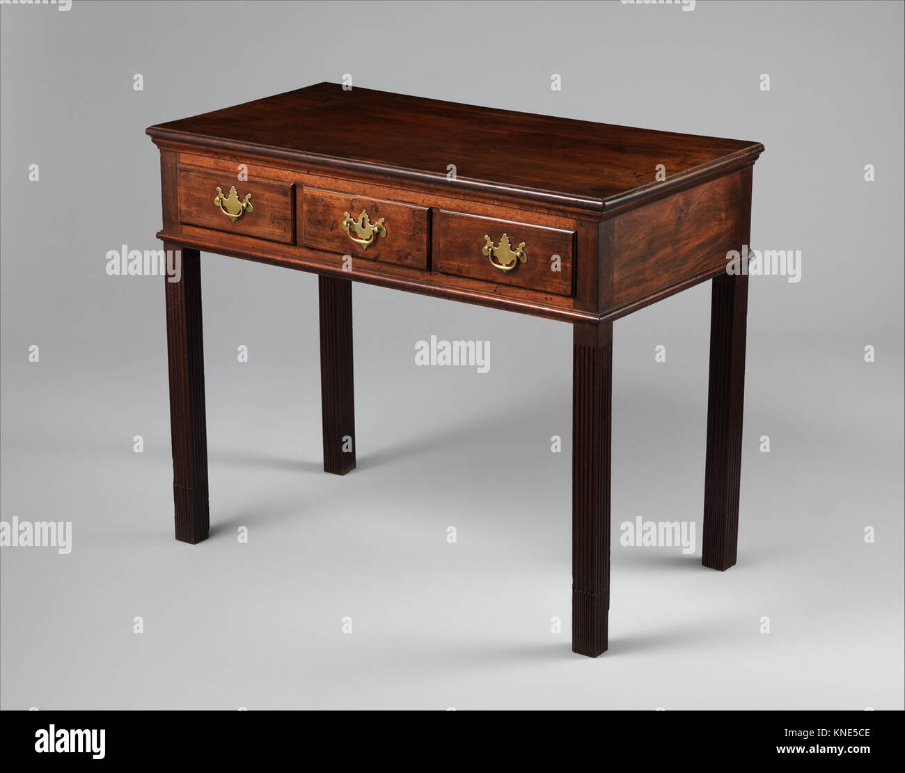 This Chippendale-style side table, crafted from mahogany, features ...
