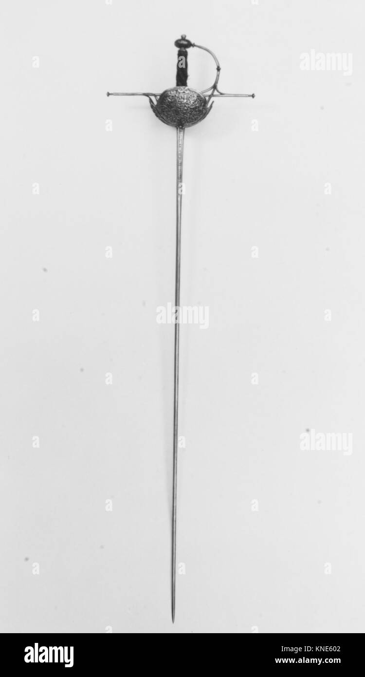 This cup-hilted rapier, a historical weapon, features a distinctive ...