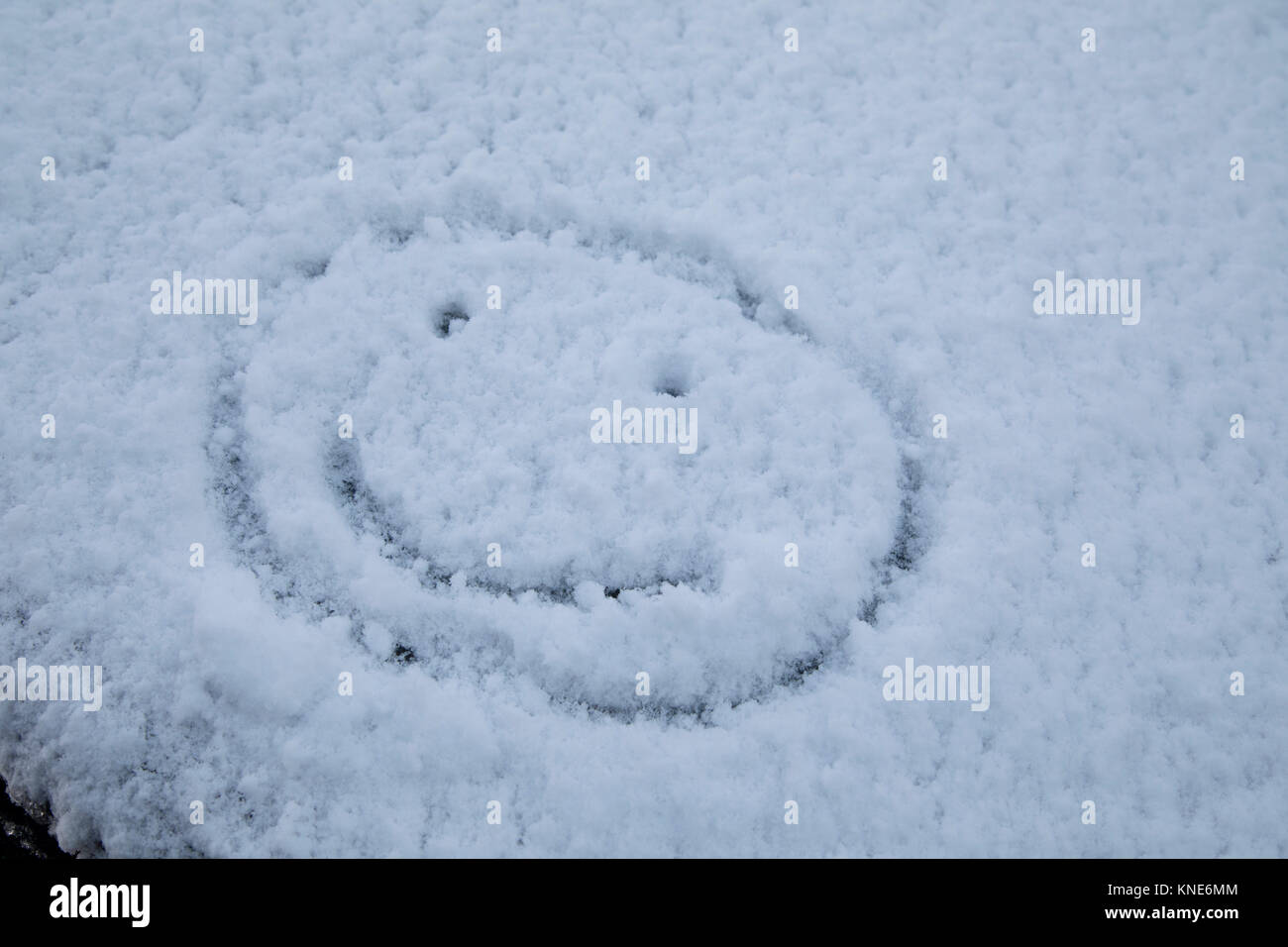 Smiley face during heavy snow fall in Birmingham, United Kingdom. Deep ...