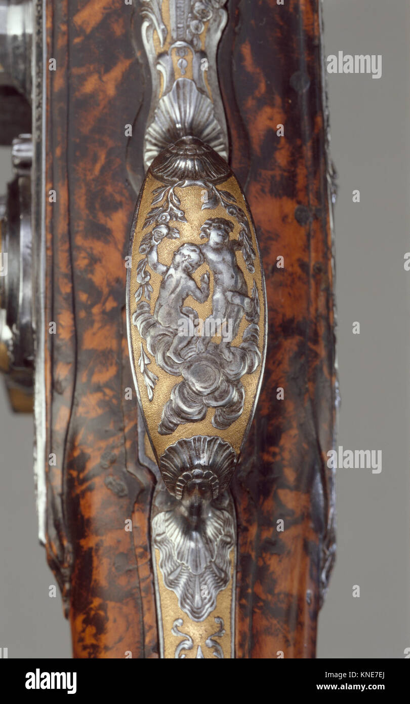 This flintlock gun features a design popular during the 18th century ...