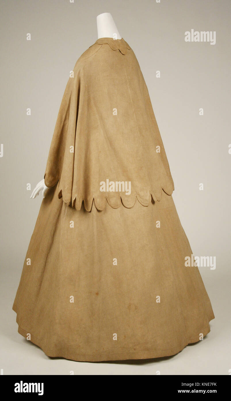 This duster from the 19th century features delicate, intricate design ...