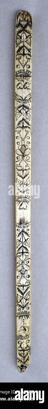 A busk, a rigid support used in historical garments to shape and ...