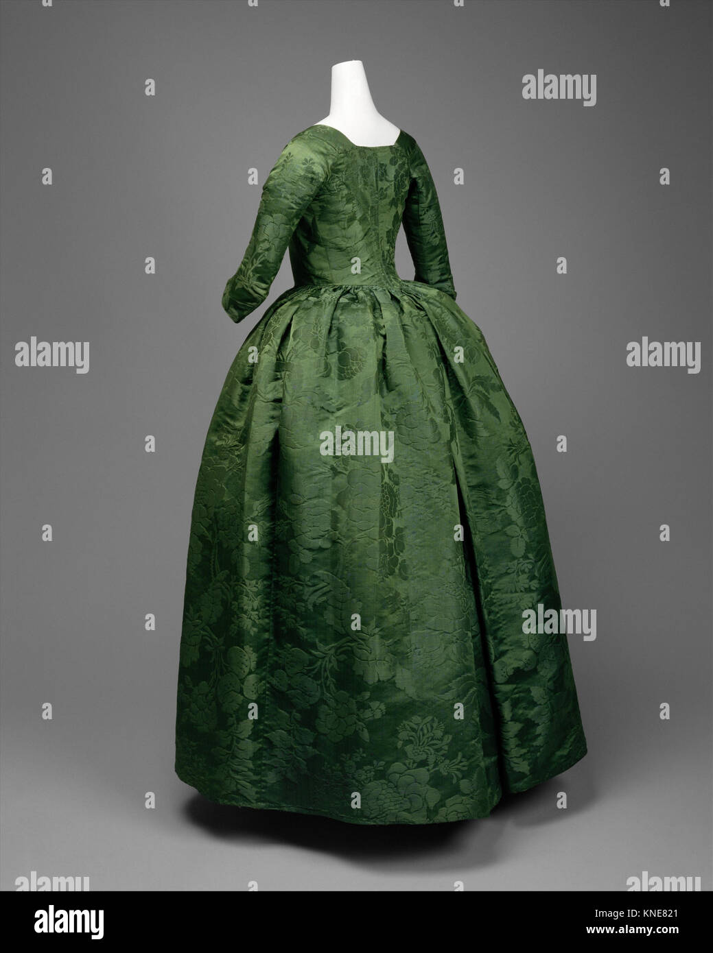This ensemble includes a coordinated set of garments, illustrating the ...