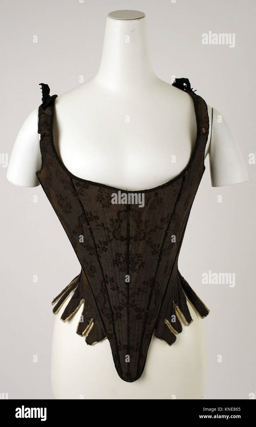 This corset, part of a historical collection, showcases the fashion and ...