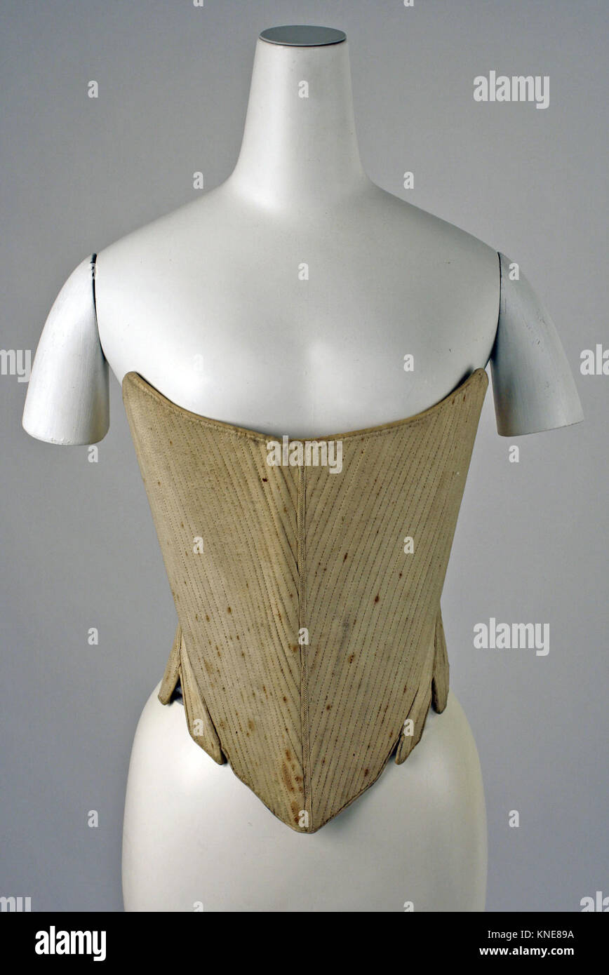 This corset, crafted from fine materials, reflects the fashion of the ...