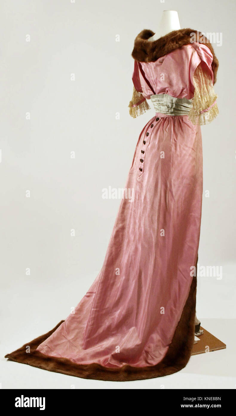 A dress, showcasing historical fashion and textile design. The piece ...