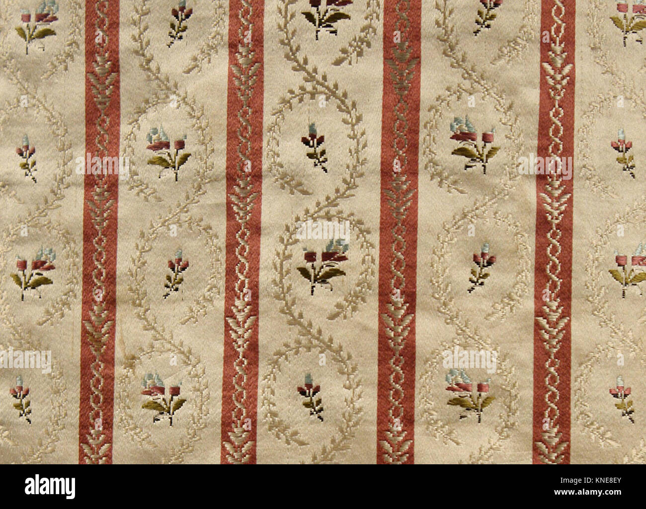 This dress, an example of fashion from the past, features intricate ...