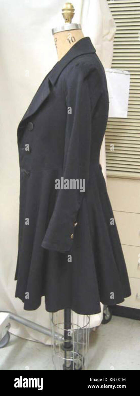 This frock coat, a stylish example of mid-19th-century fashion ...