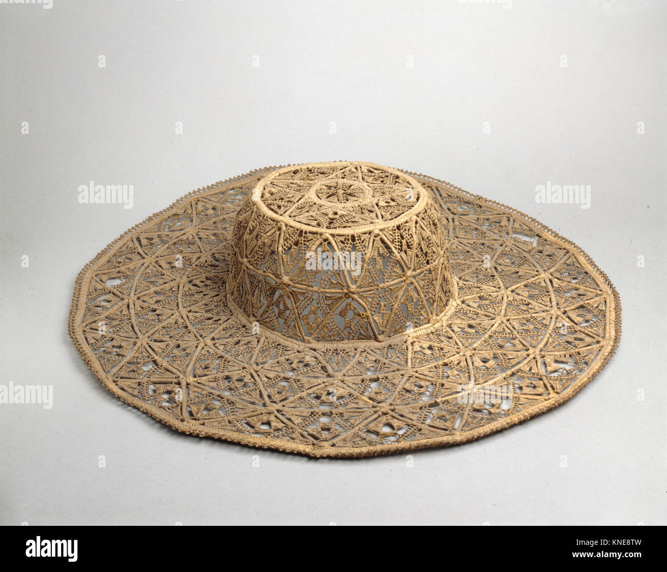 This historical hat showcases detailed design and craftsmanship. The ...