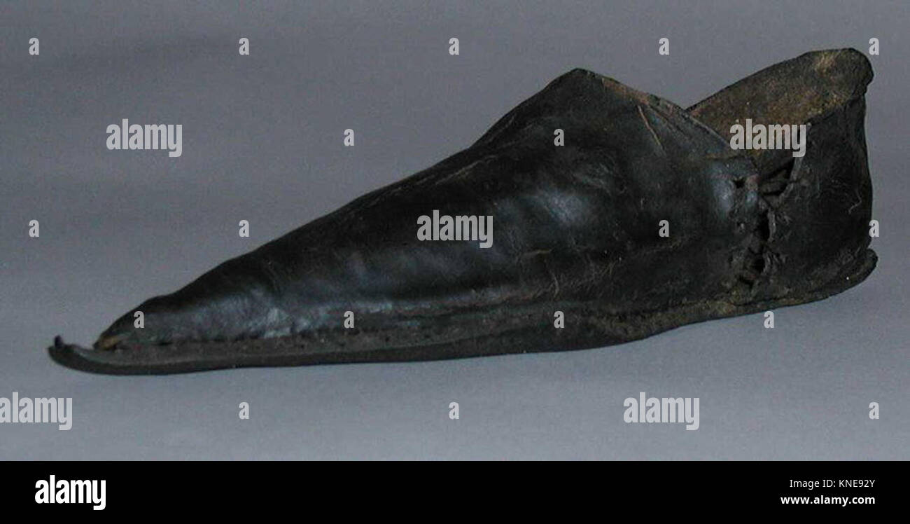 This pair of Crakows, a type of medieval footwear, is an example of the ...