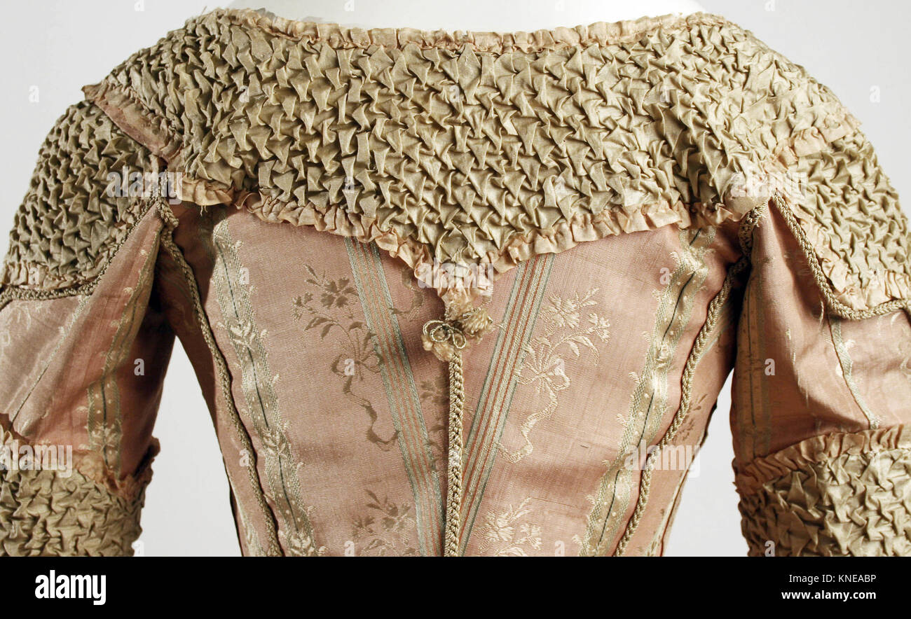 This dress, from the early 20th century, demonstrates the fashion ...