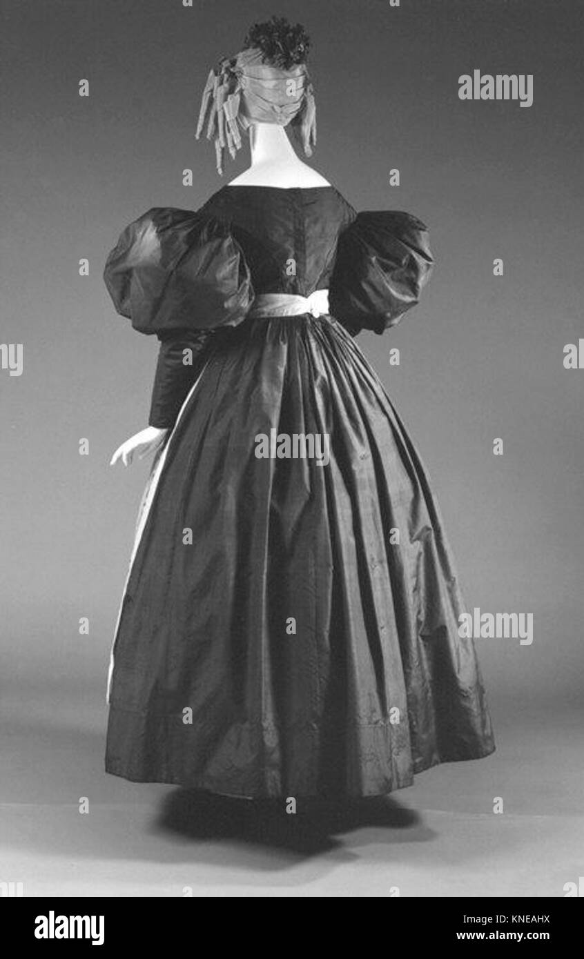 This dress illustrates the fashion trends of its period, highlighting ...