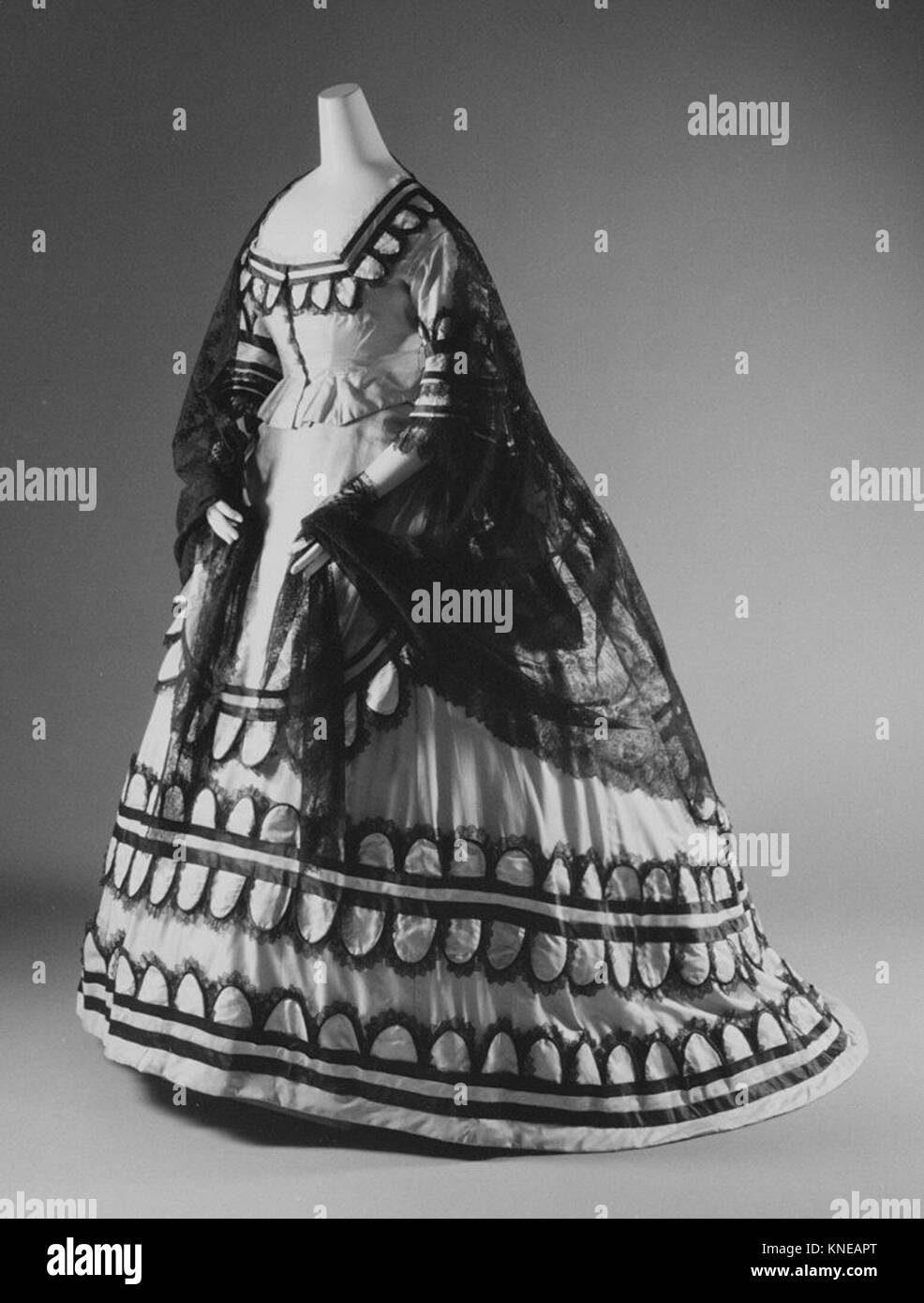 This dress, preserved in the MET collection, showcases intricate fabric ...