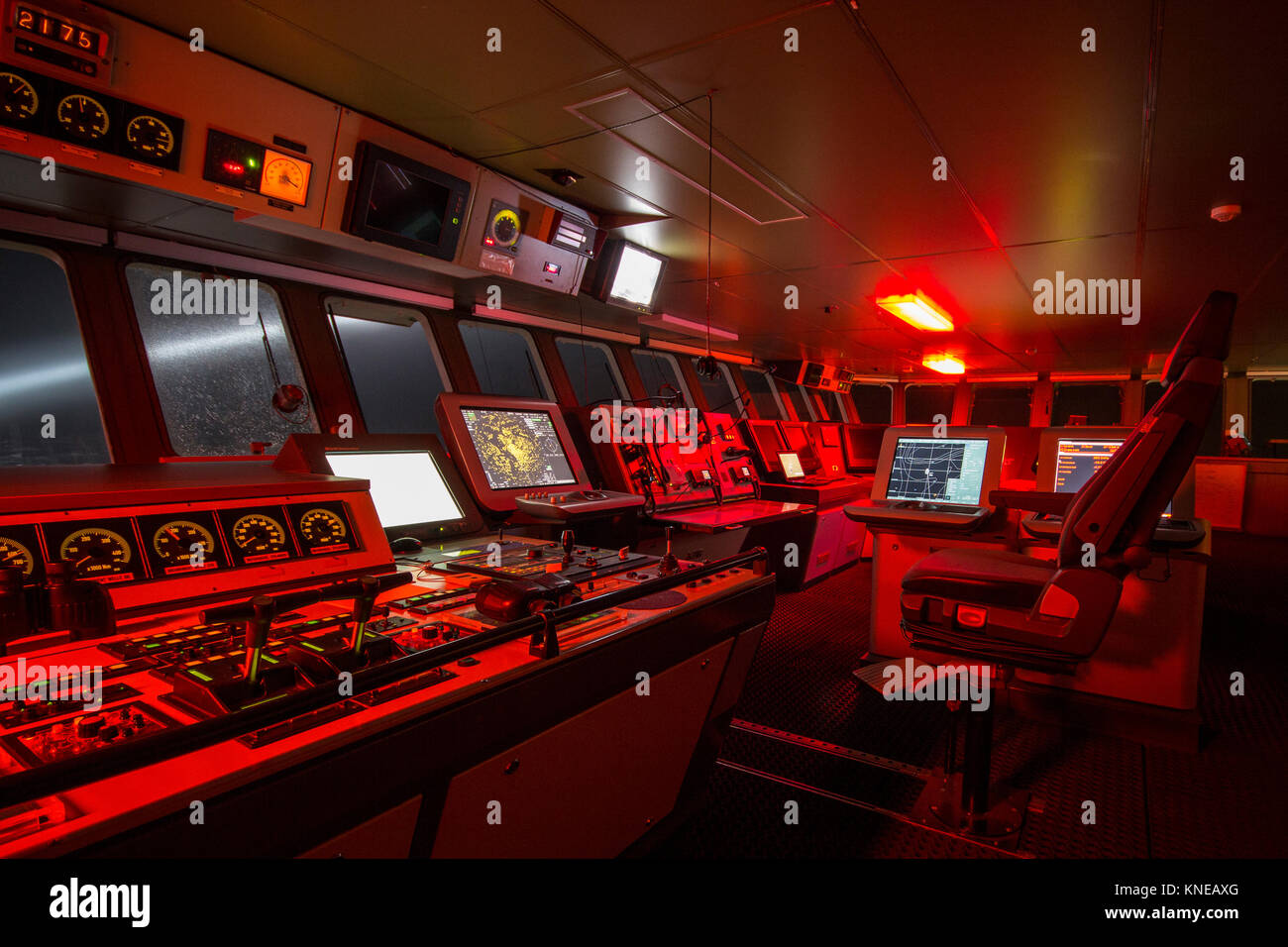 Bridge of a polar research vessel while cruising at night during a snow ...