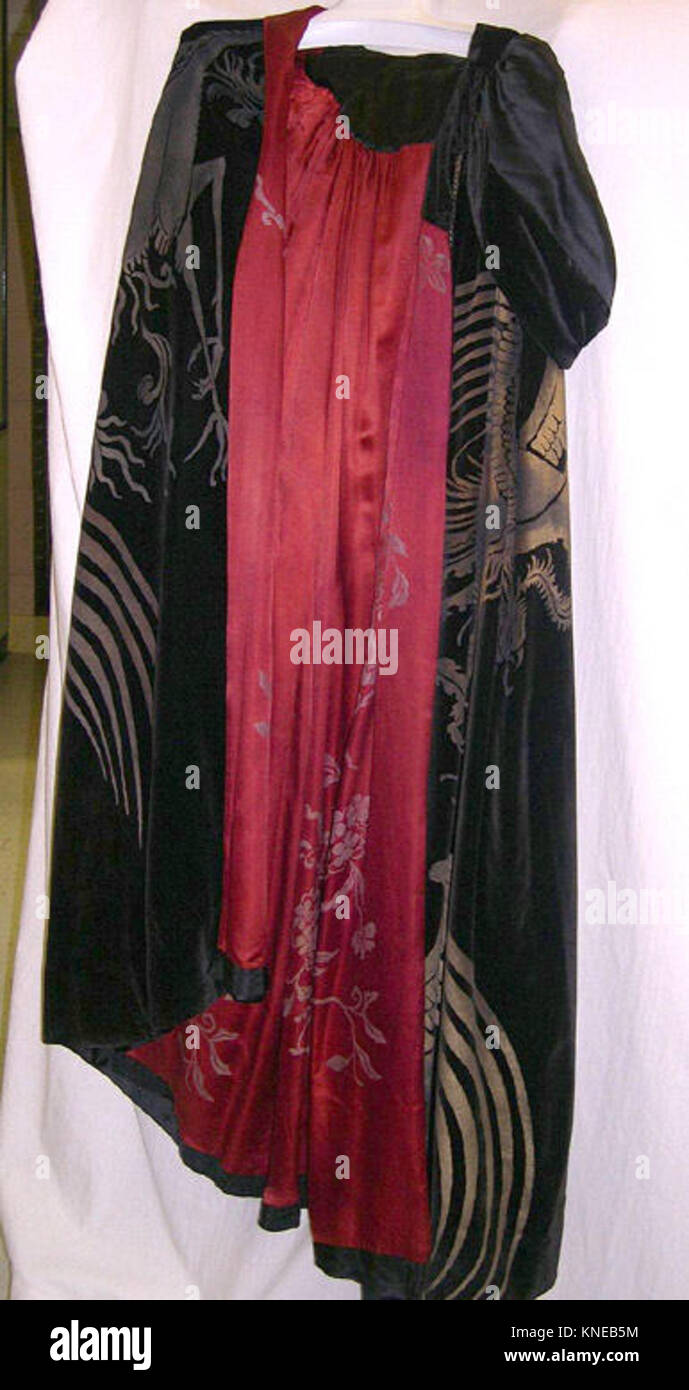 This elegant evening cape showcases fine craftsmanship in fabric and ...