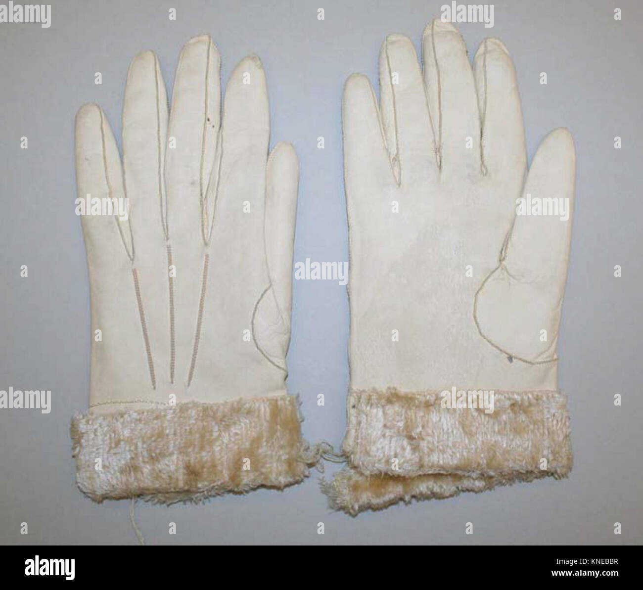 These gloves, a fine example of period craftsmanship, reflect the ...
