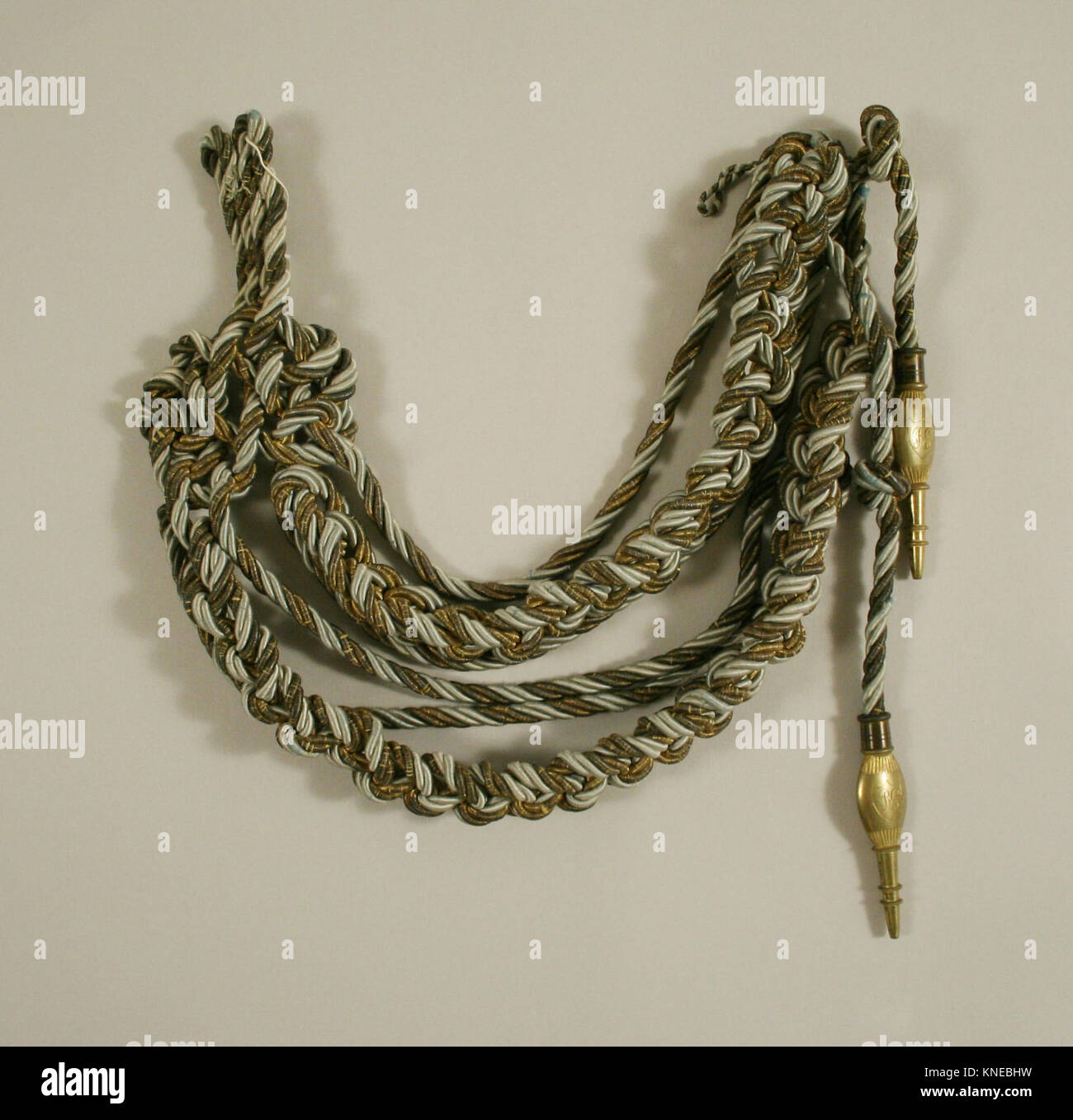This aiguillette, part of the MET collection, is a decorative shoulder ...