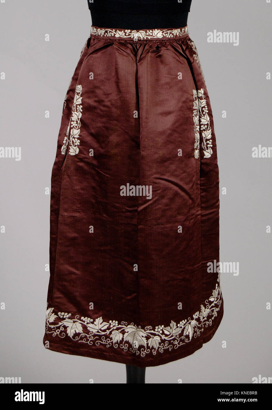 A historical apron, likely worn as part of 18th or 19th-century attire ...