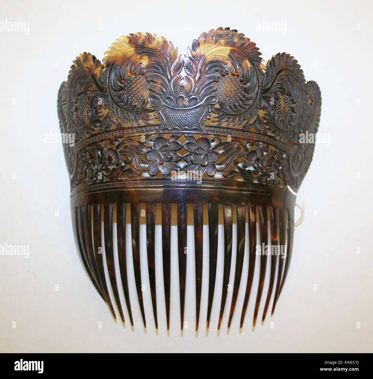 This ancient comb, made of bone or ivory, illustrates personal grooming ...