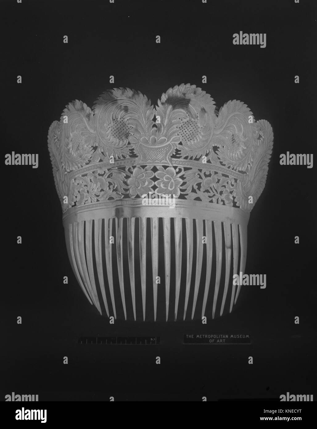 This comb, made from bone or wood, was an everyday object with both ...