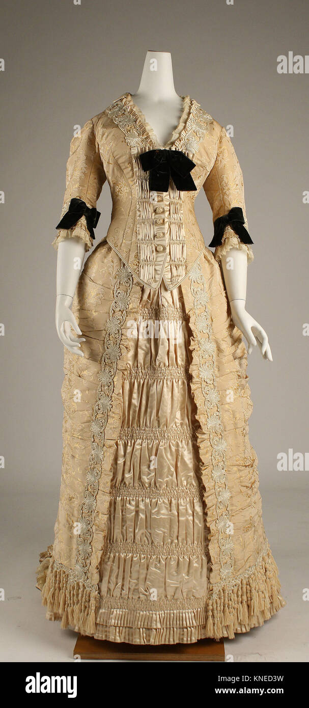 This dinner dress from the late 19th century exemplifies the fashion ...
