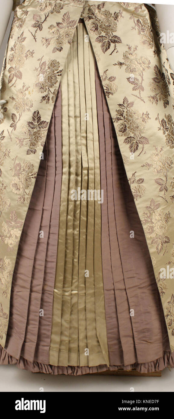 This dress, labeled MET C.I.37.27.3ab, is part of the museum's ...