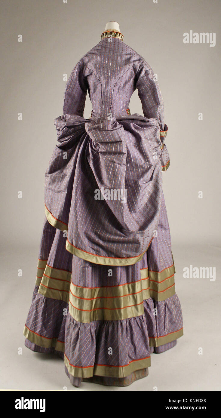 This dress, part of the museum's collection, showcases the fashion of ...