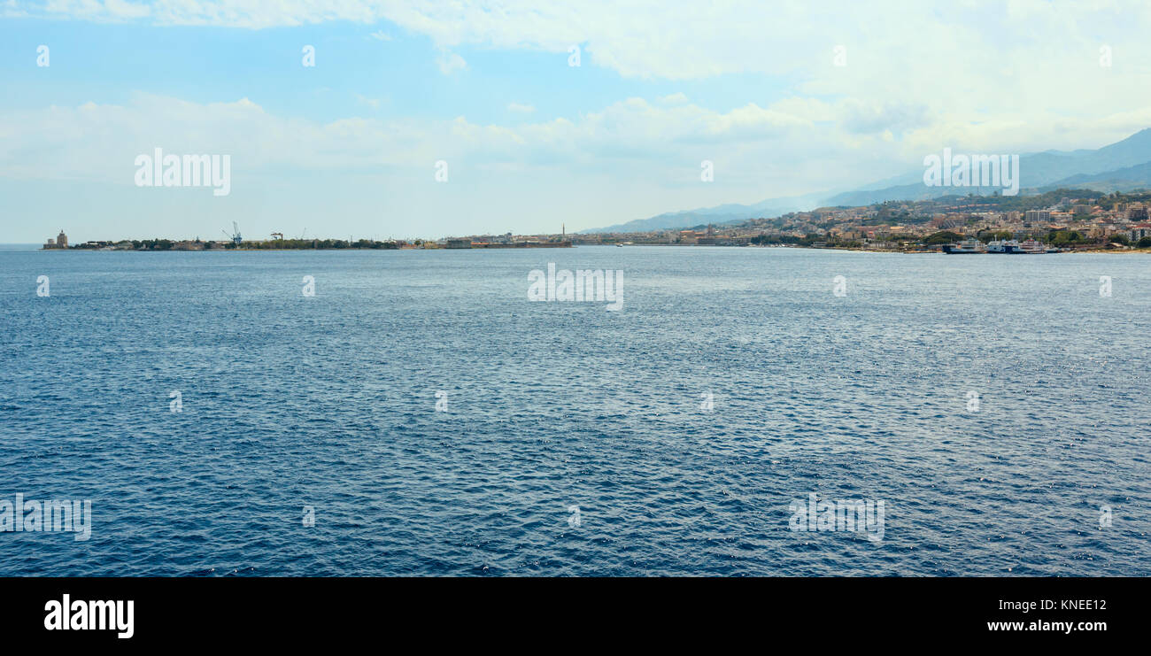 View of the Messina sea strait and coastline from the side of the ferry ...