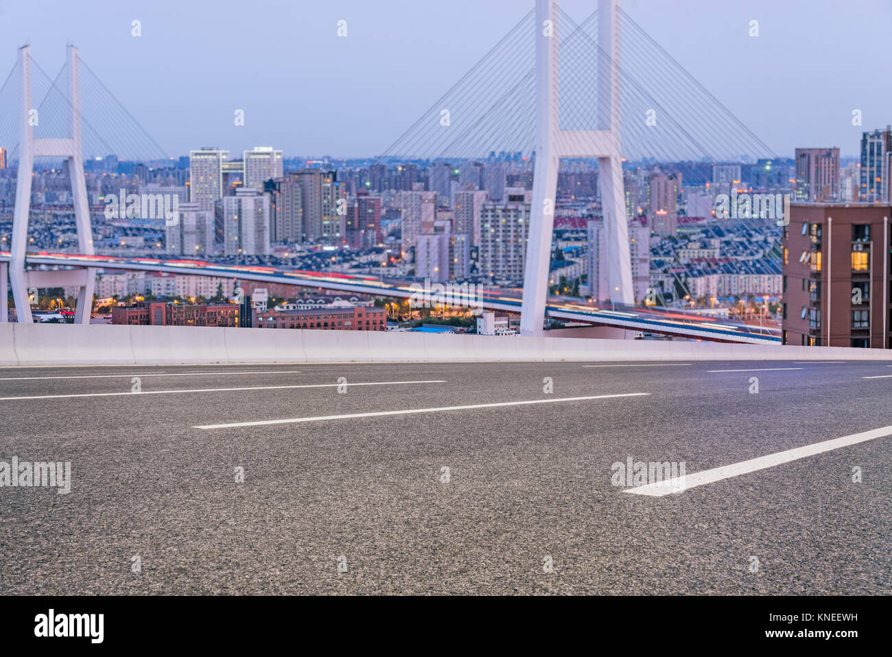 empty asphalt road through modern city in China Stock Photo - Alamy