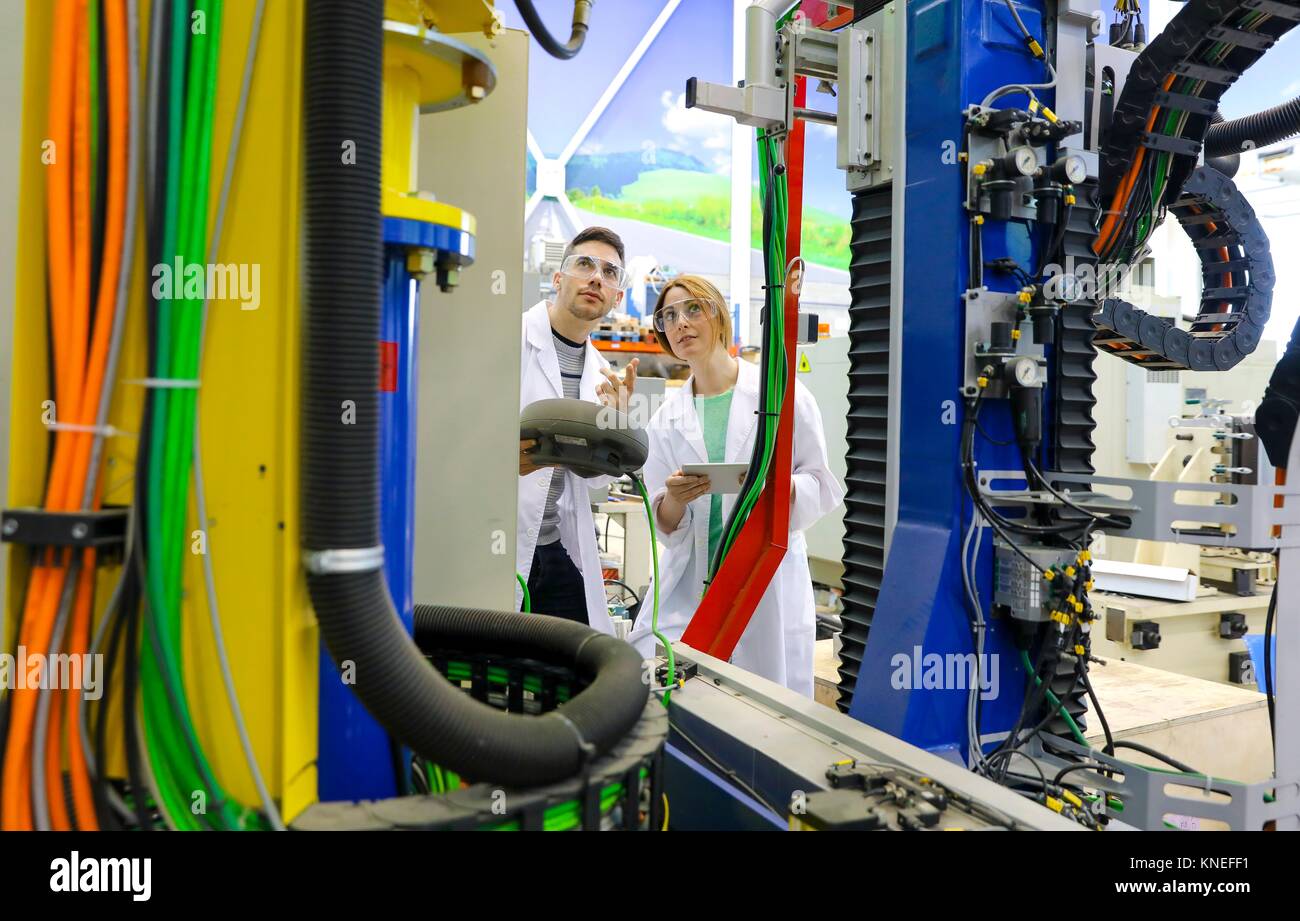 Robotic mobile platform for aeronautical drilling. Researchers working ...