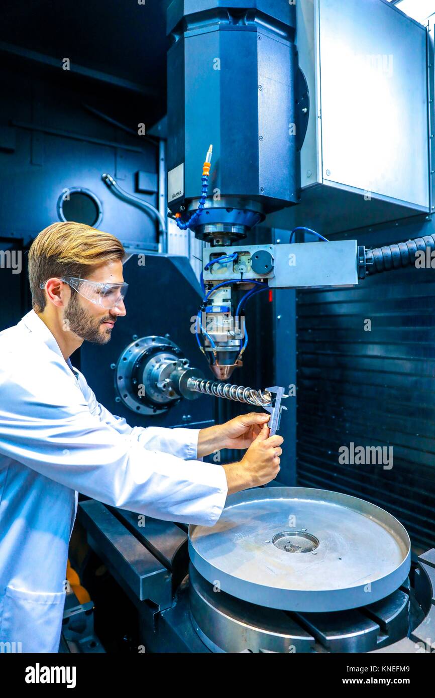 Laser additive manufacturing machine hi-res stock photography and ...