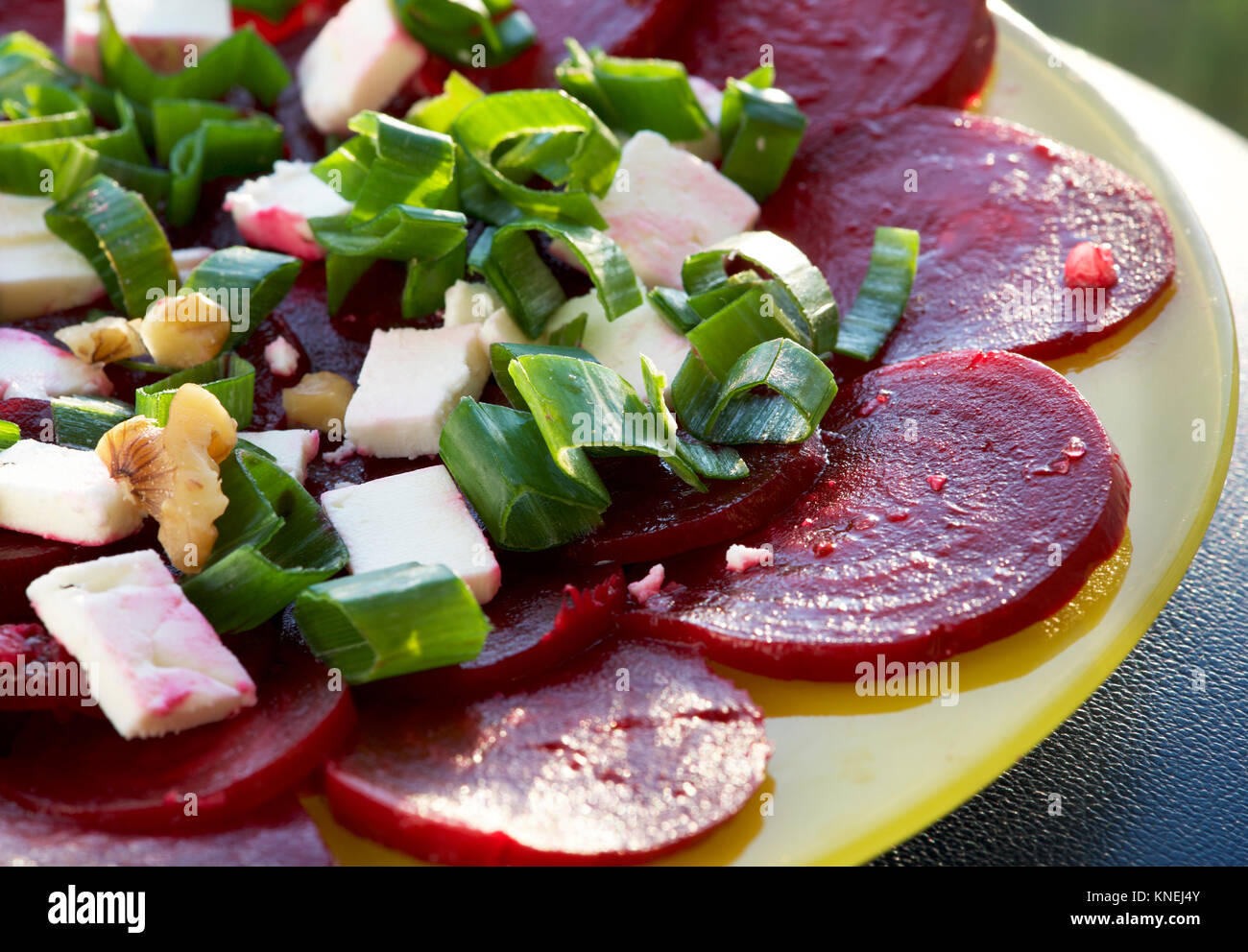Roasted beetroot with spring onion and cheese Stock Photo - Alamy