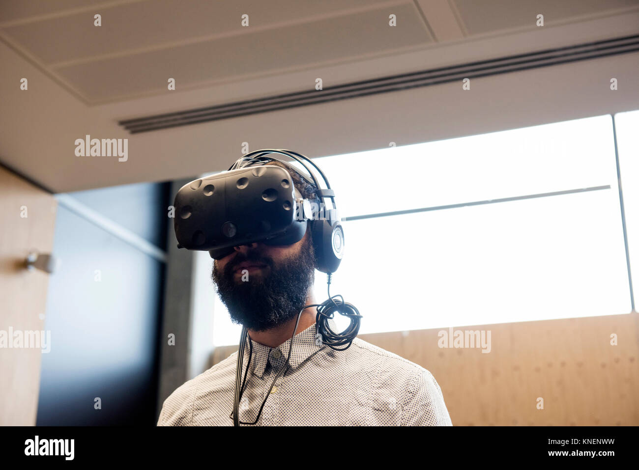 Man wearing virtual reality headset Stock Photo - Alamy