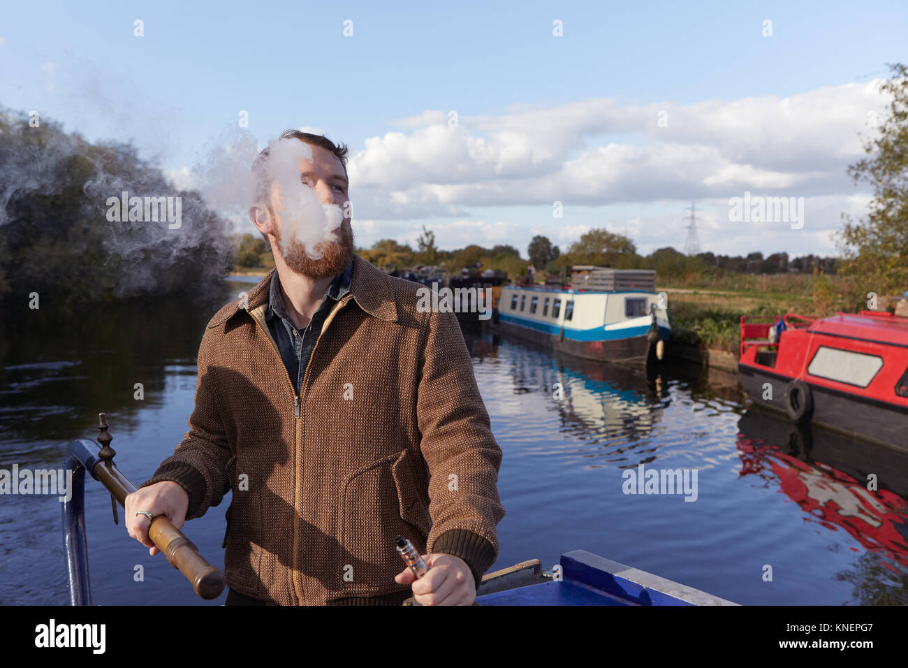 Man steering canal barge hi-res stock photography and images - Alamy