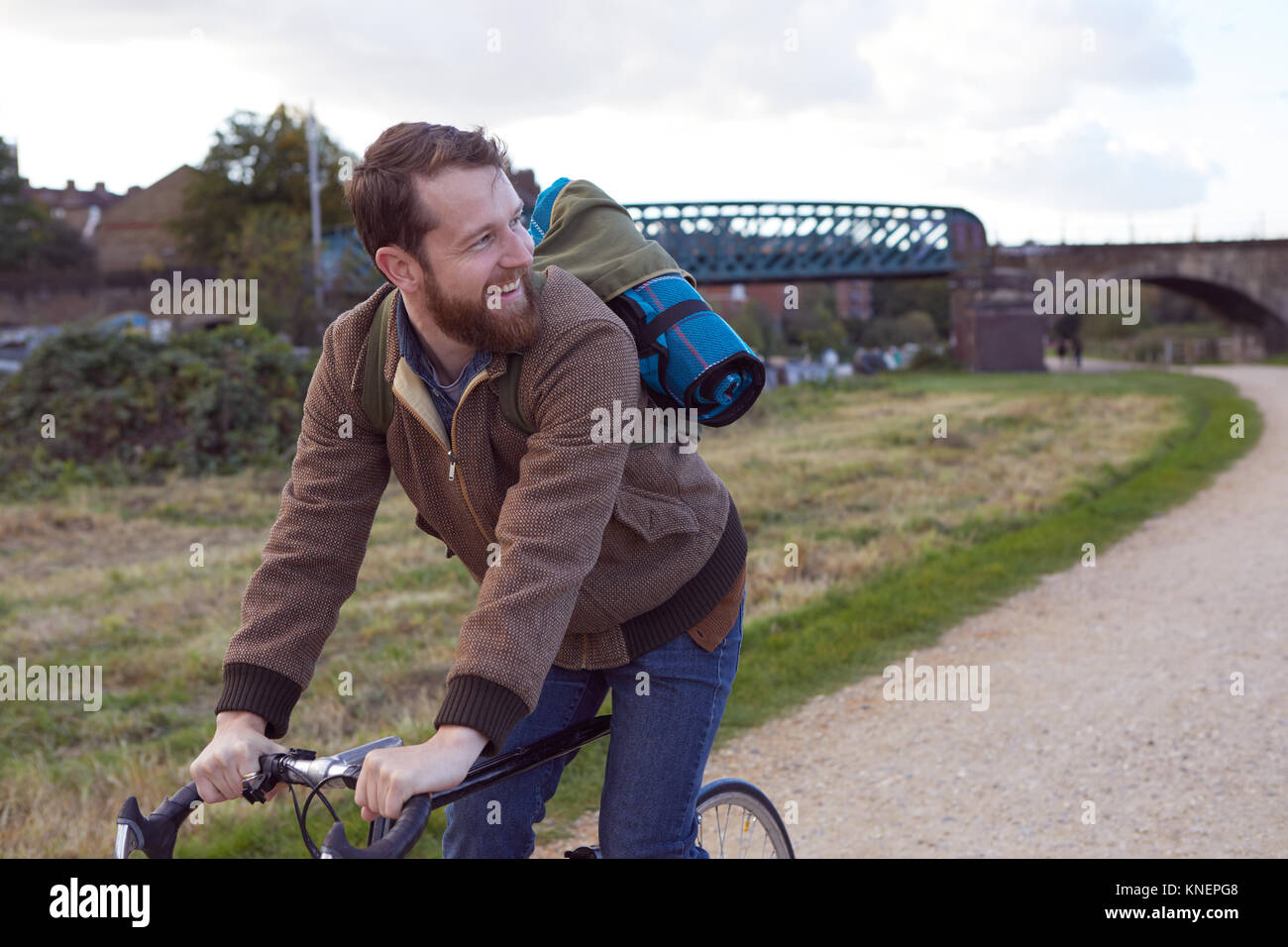 Man cycling on path Stock Photo - Alamy
