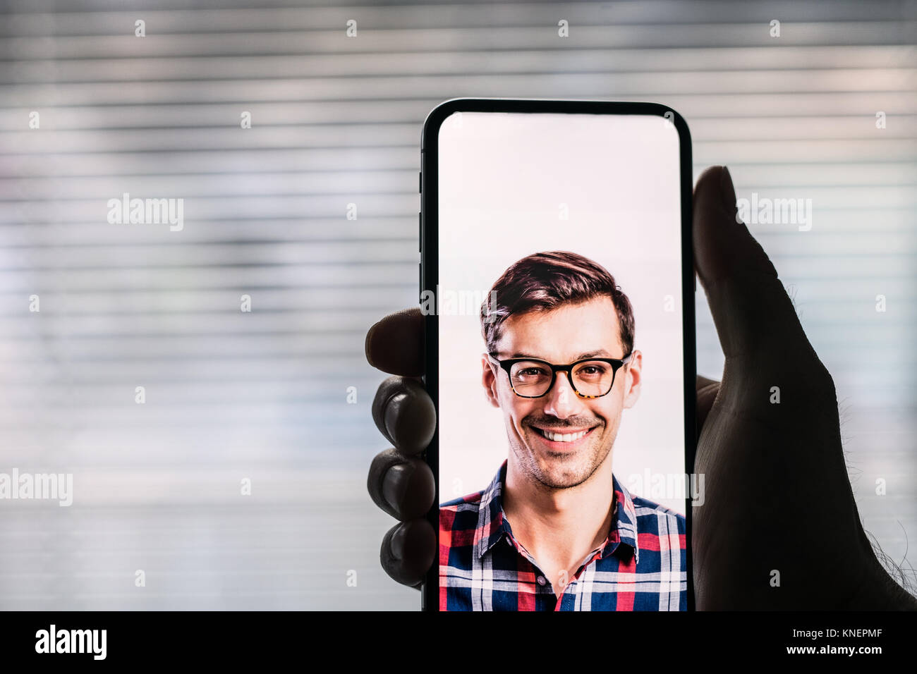 A smartphone using face ID recognition system Stock Photo - Alamy