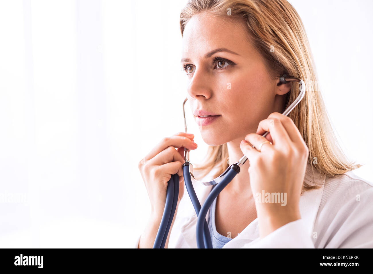 Young female medical doctor working hi-res stock photography and images ...