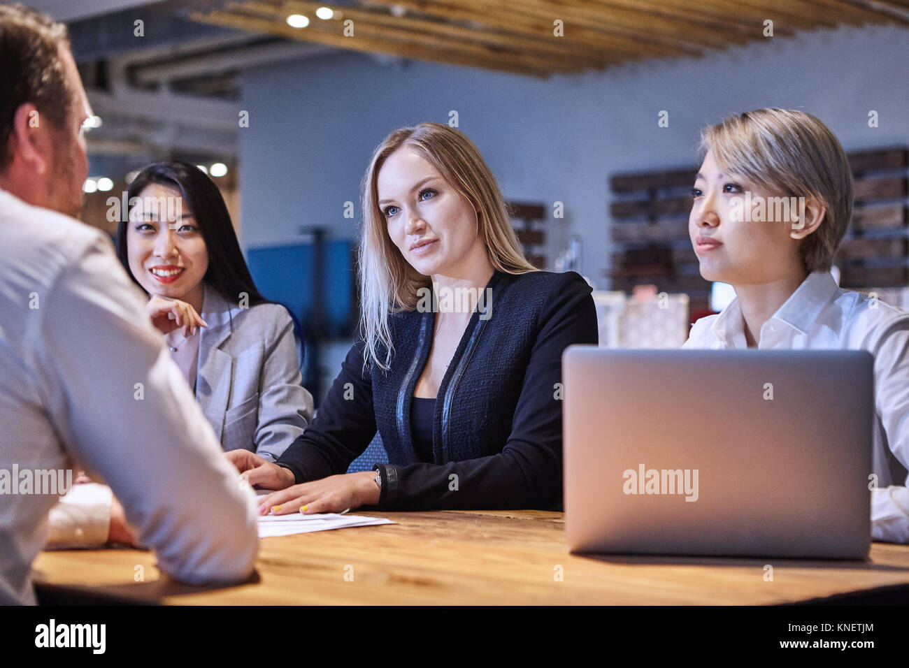 Colleagues in business meeting Stock Photo - Alamy