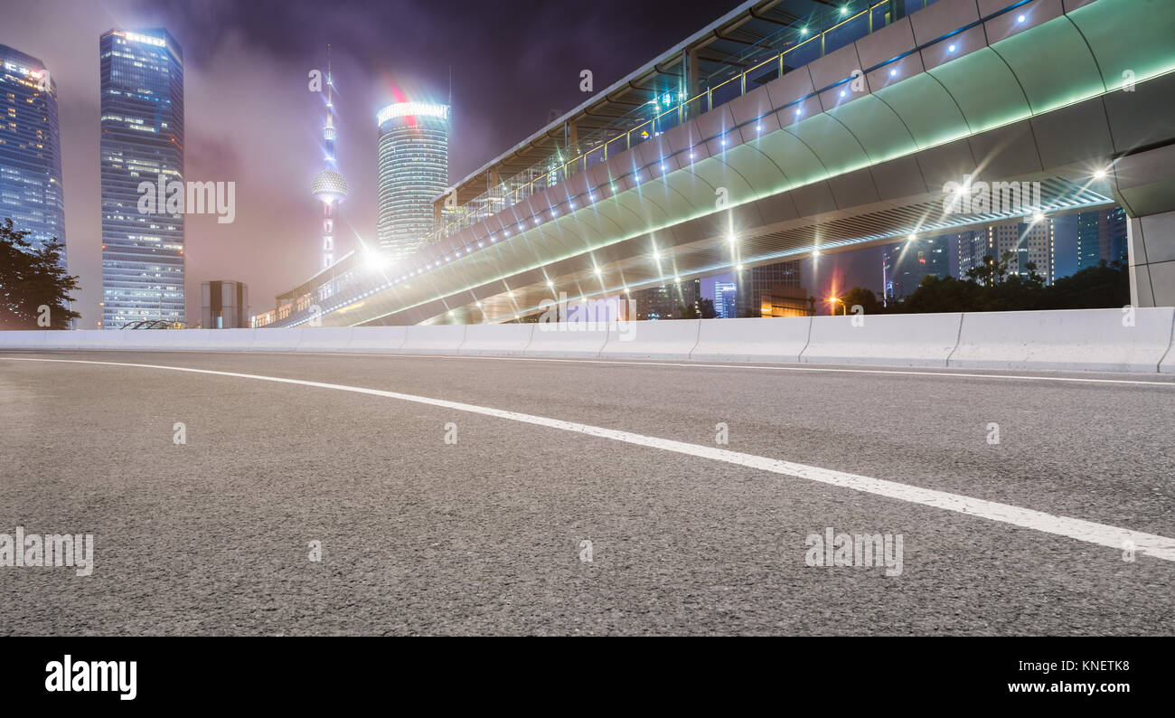 empty asphalt road through modern city in China Stock Photo - Alamy
