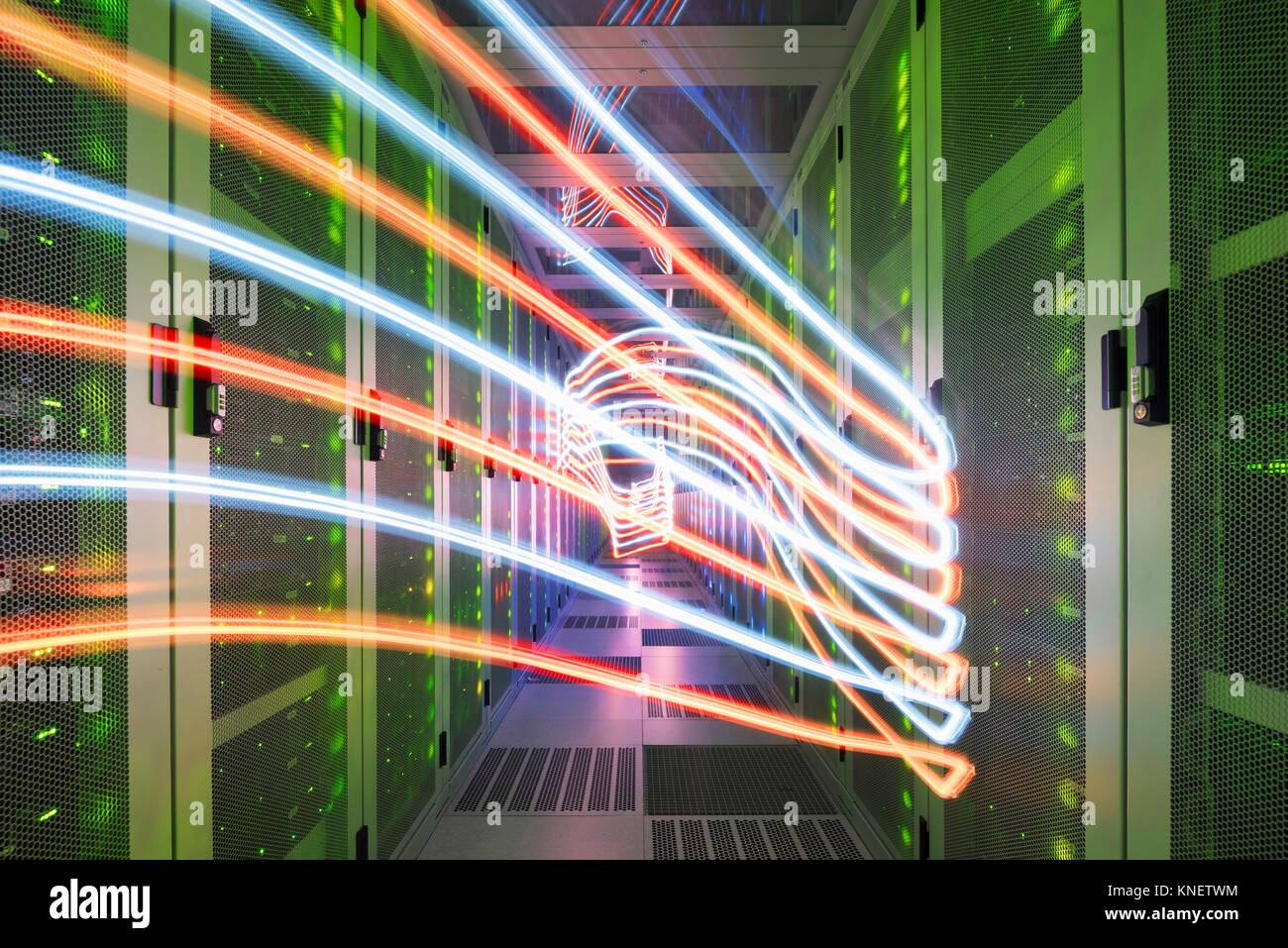 Interior of data centre, lights trails showing travelling data Stock ...