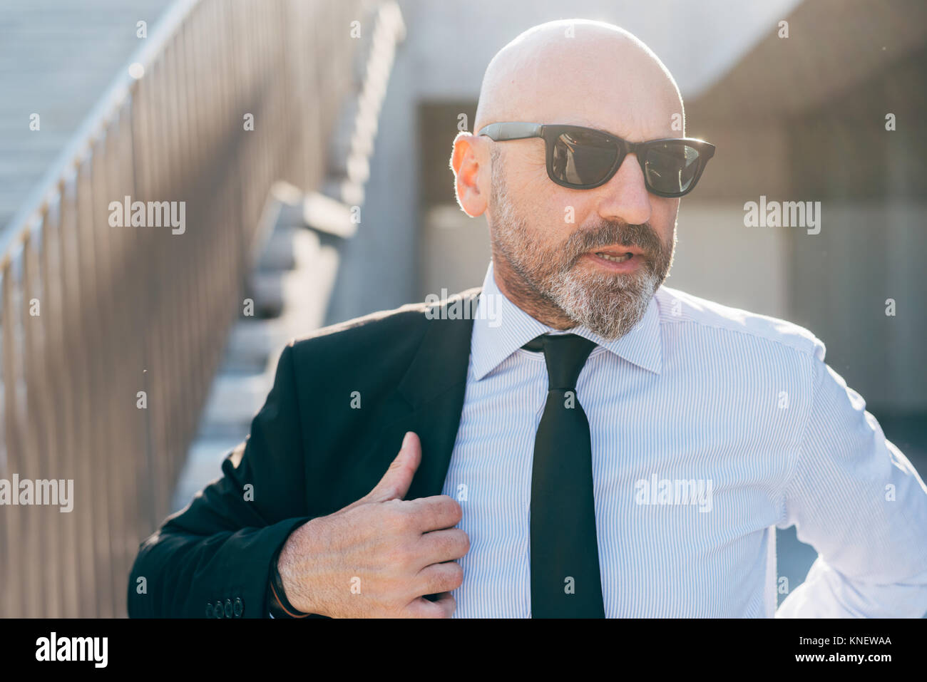 Putting on jacket business hi-res stock photography and images - Alamy