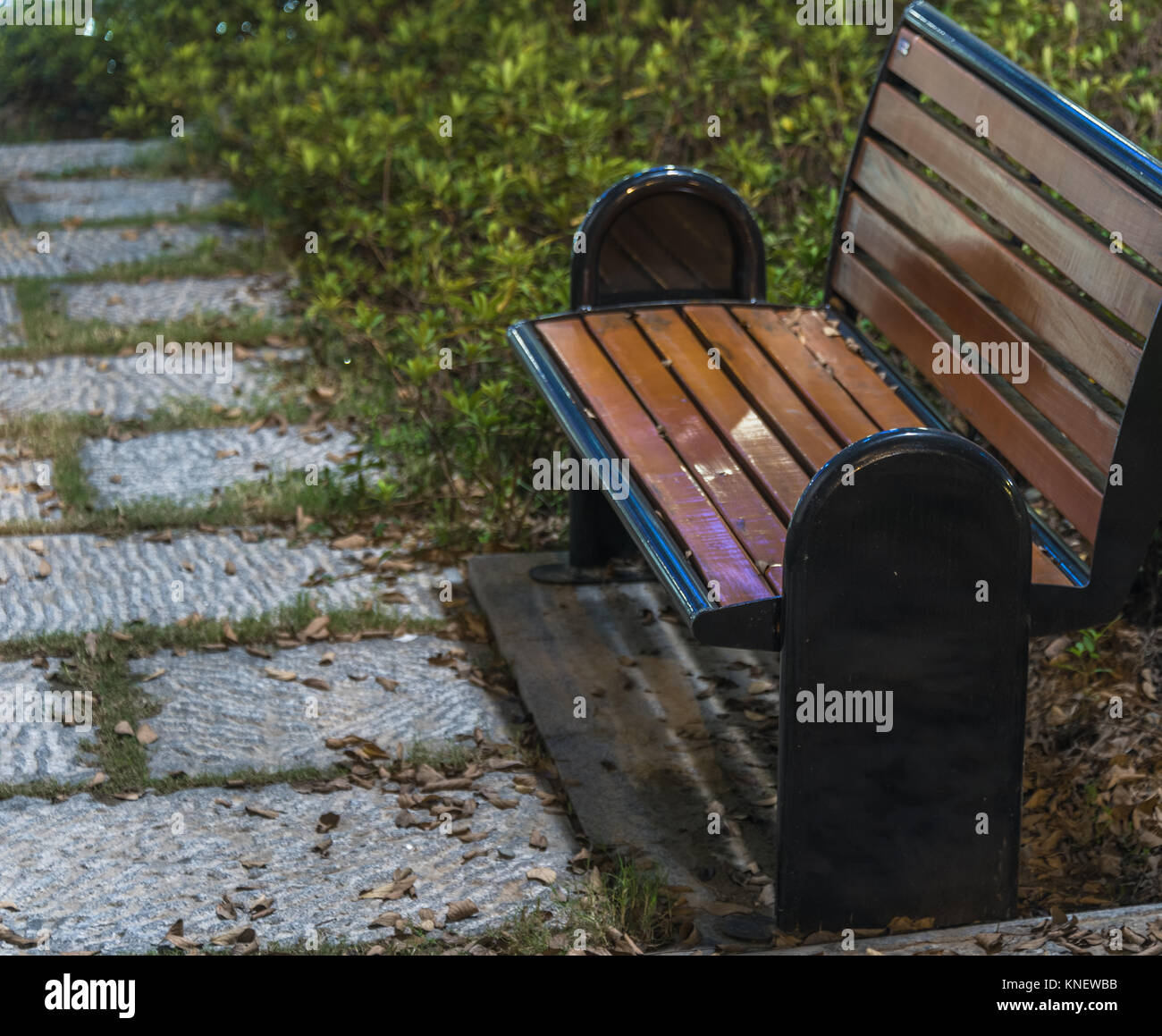 Bench in a park on sunny day in city of China Stock Photo - Alamy