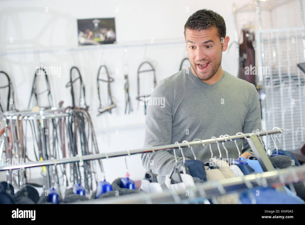 man in riding store Stock Photo - Alamy