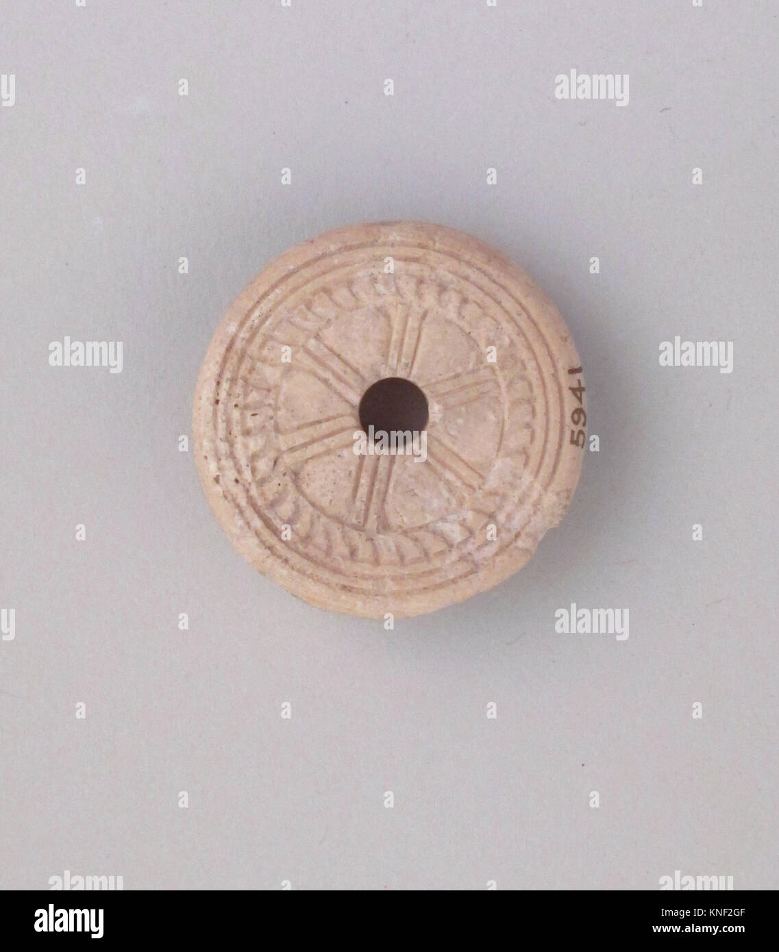 Spindle whorl. Culture: Cypriot; Medium: Bone ?; Dimensions: Diameter ...