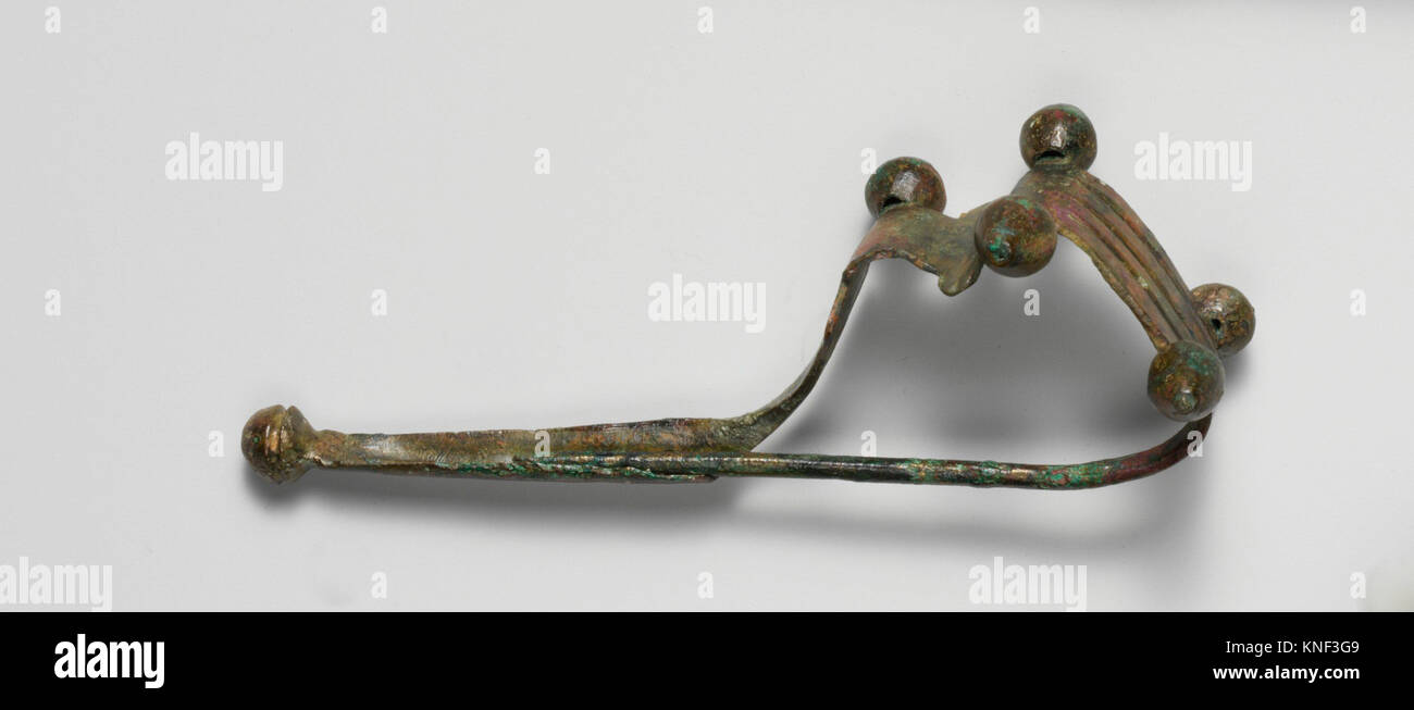 Bronze bow type fibula hi-res stock photography and images - Alamy